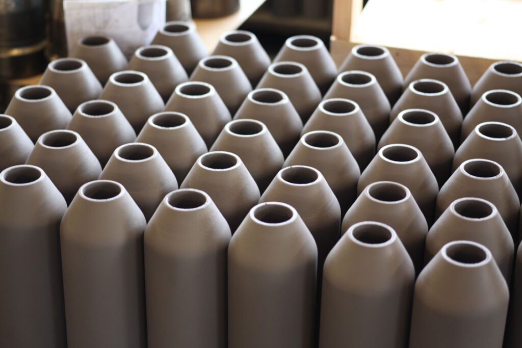 Rod and nozzle systems for foundry pressure pour and continuous casting